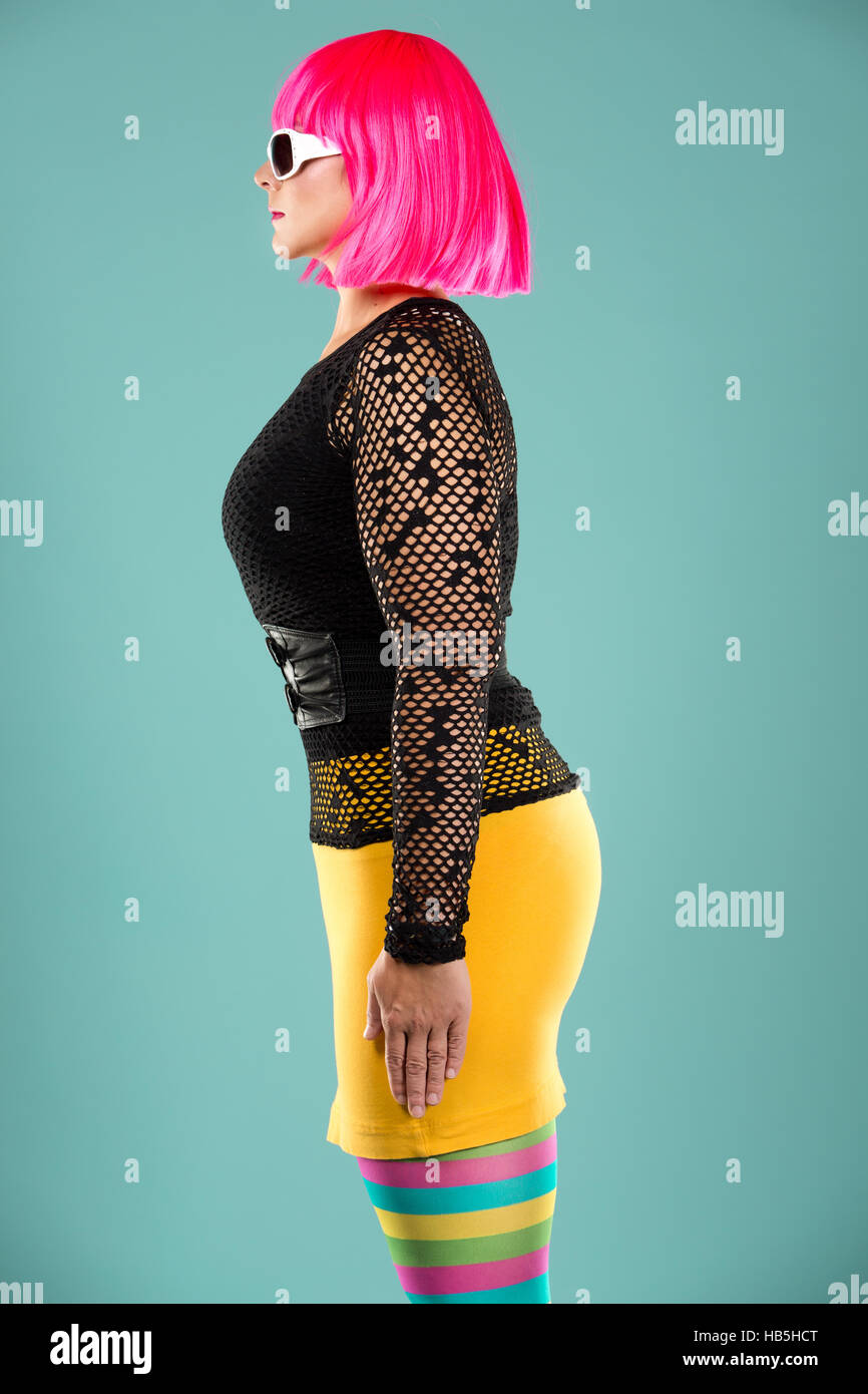 fashion woman in bright outfit Stock Photo - Alamy