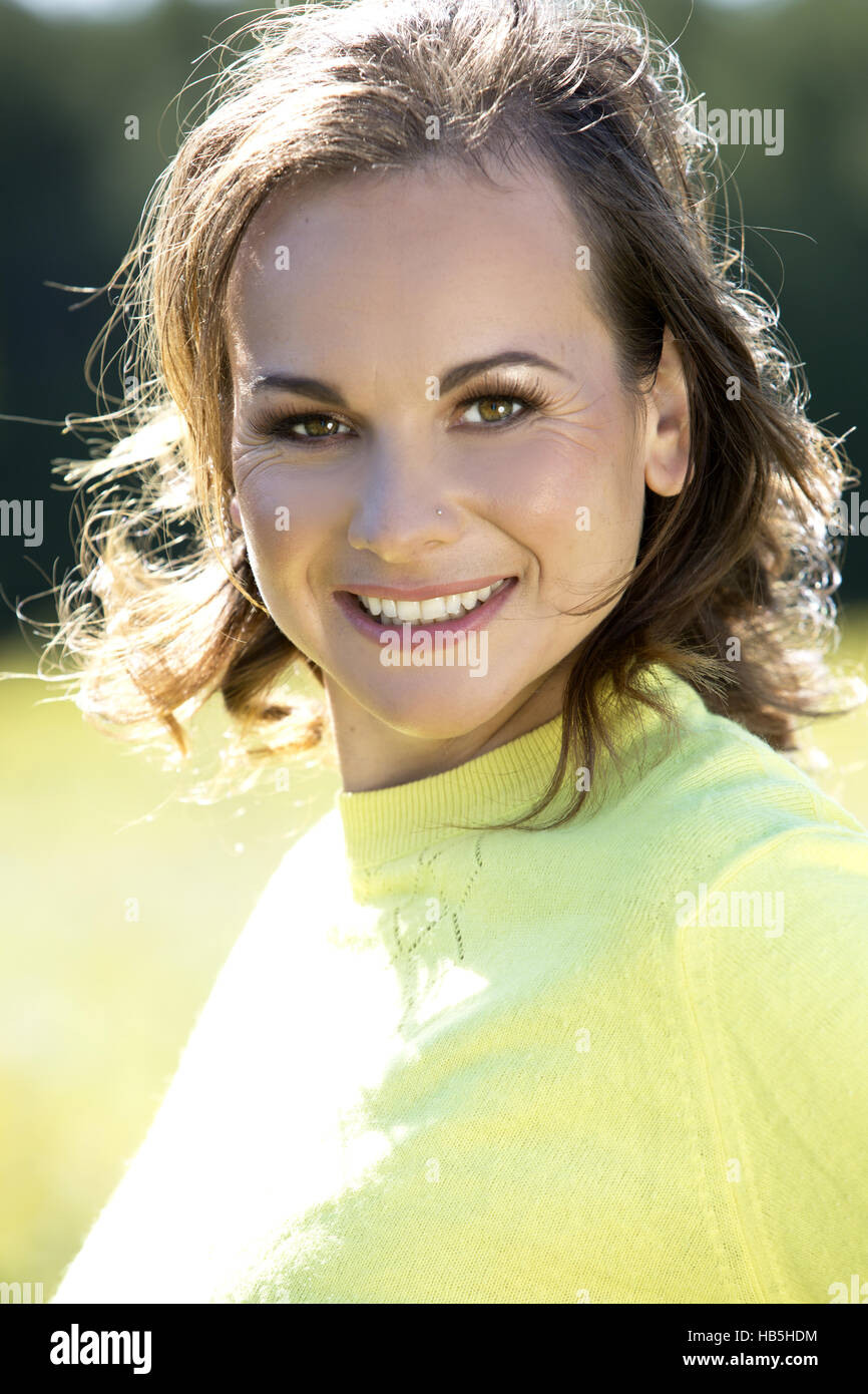 woman wearing yellow fall outfit Stock Photo - Alamy