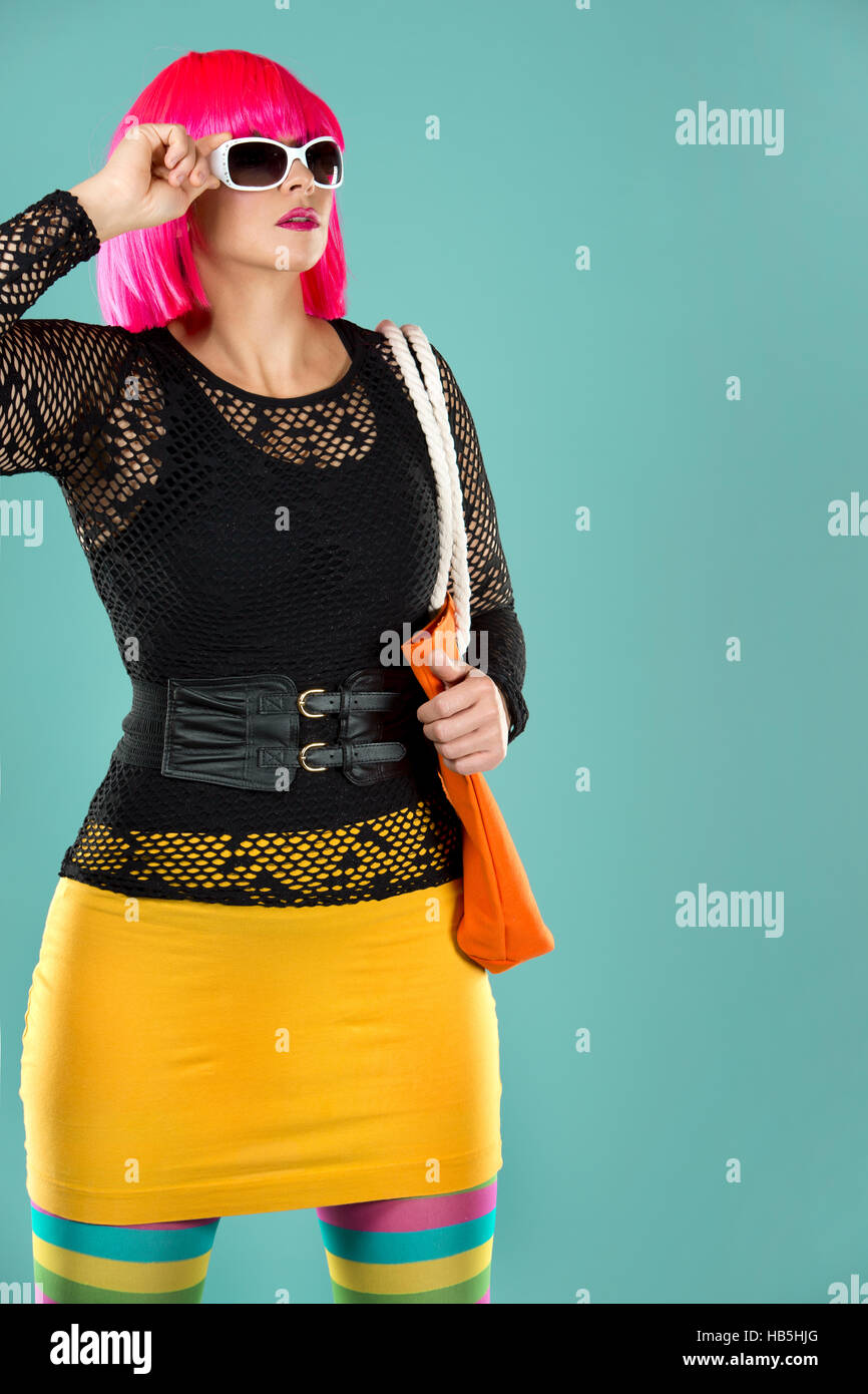 fashion woman in bright outfit Stock Photo - Alamy