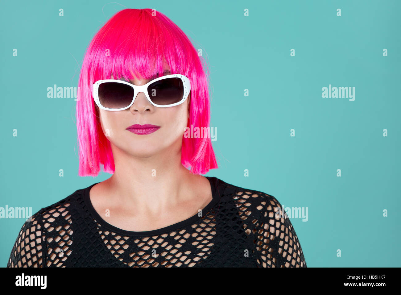 fashion woman in bright outfit Stock Photo - Alamy