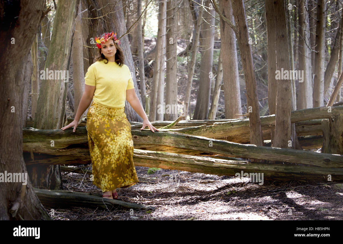 woman wearing yellow fall outfit Stock Photo - Alamy