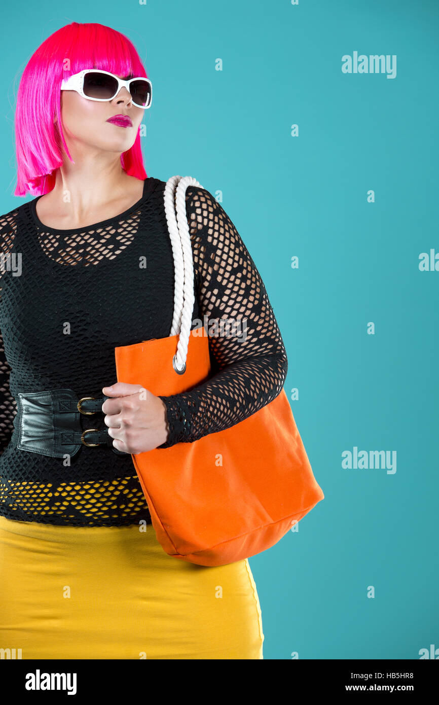 fashion woman in bright outfit Stock Photo - Alamy