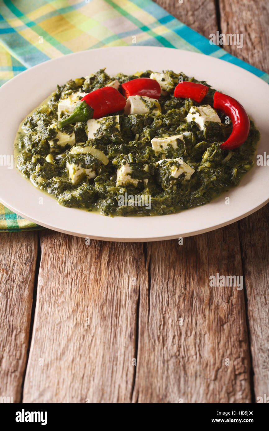 Indian Palak Paneer Spinach with cheese and spices close-up on the ...