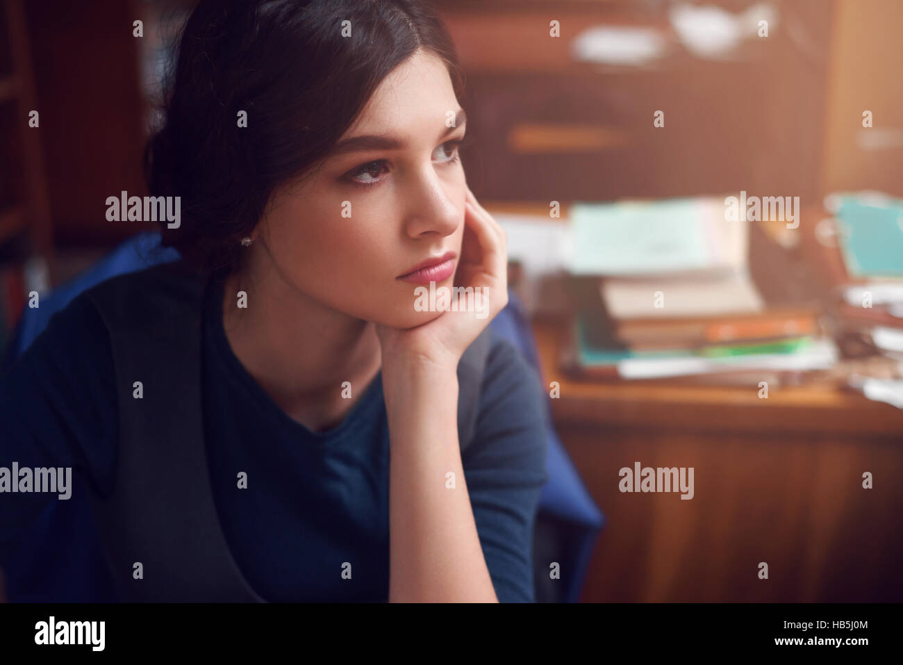Portrait of clever young woman thinking alone Stock Photo - Alamy