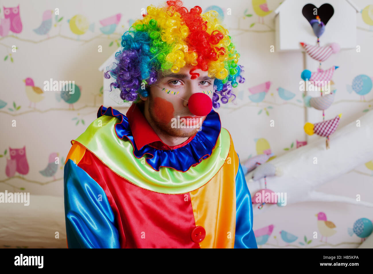 Upset lonely clown Stock Photo - Alamy