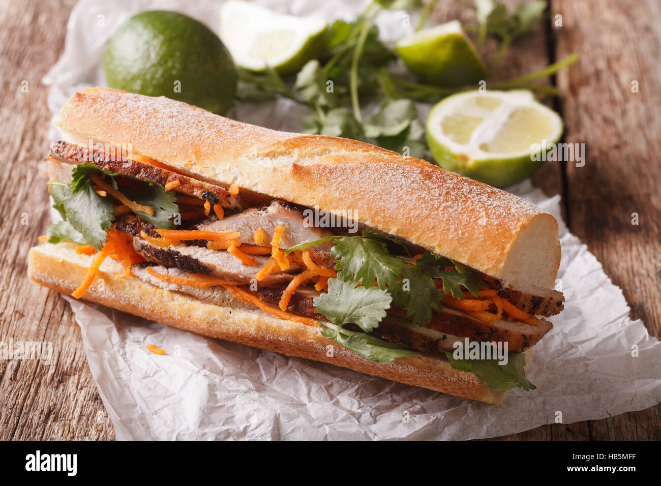 Vietnamese Pork Banh Mi Sandwich with Cilantro and carrot close-up on ...