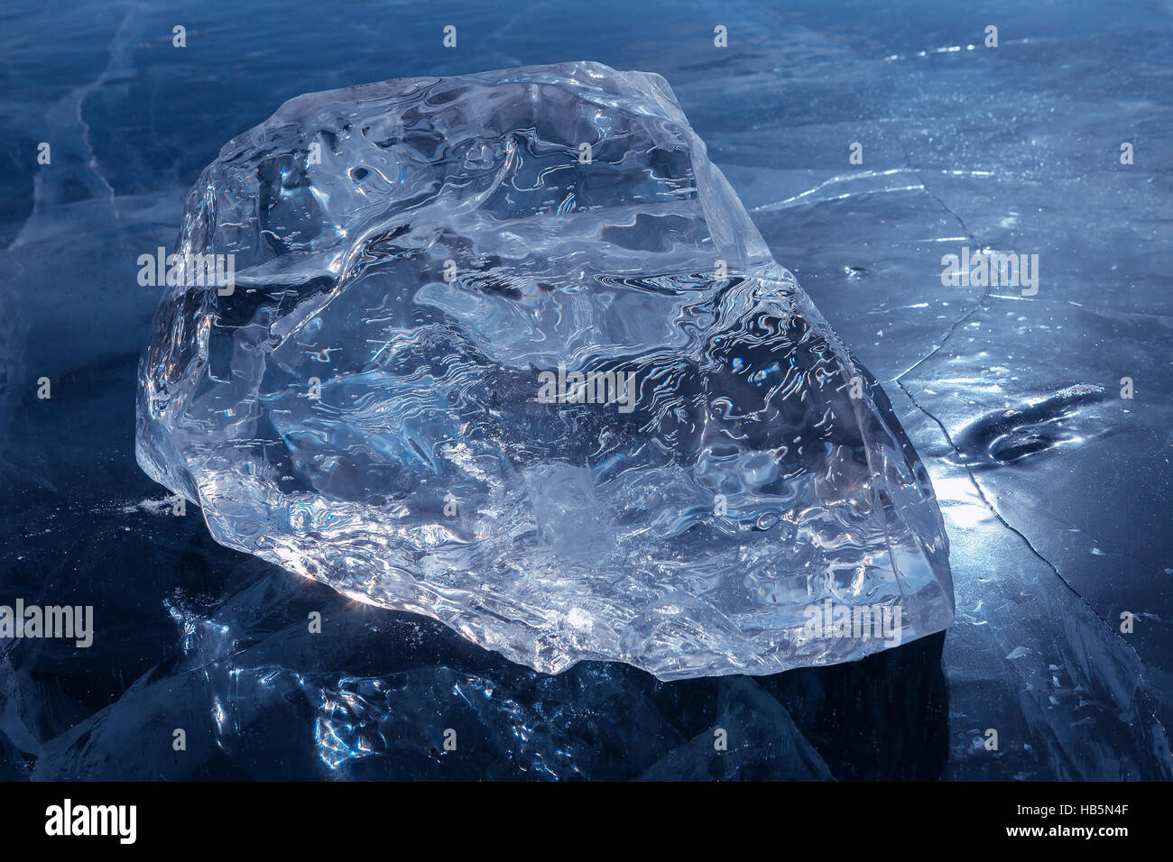 Beautiful transparent block of ice Stock Photo - Alamy