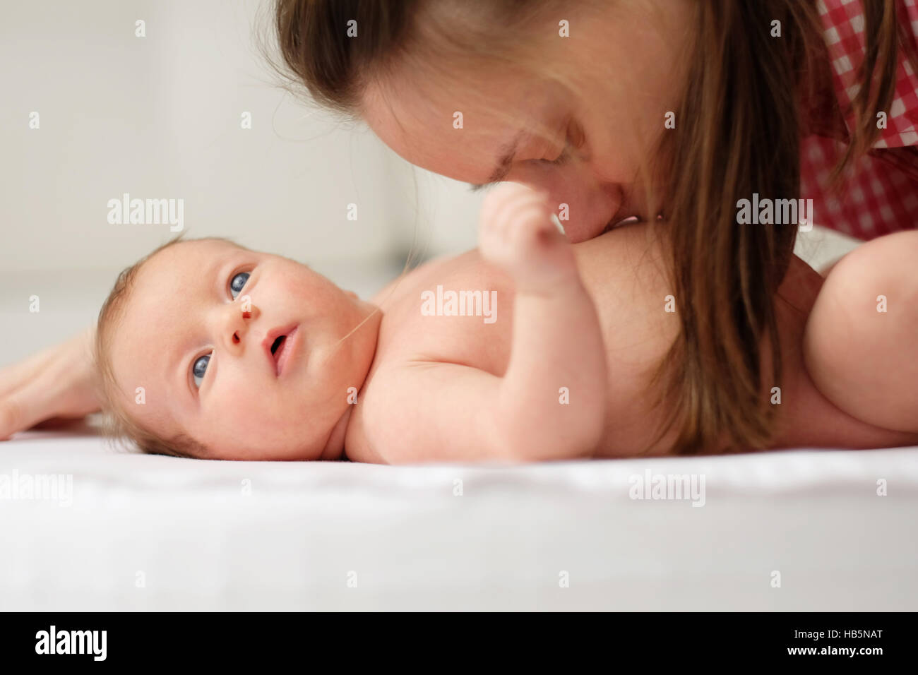 One month old newborn baby with mother Stock Photo - Alamy
