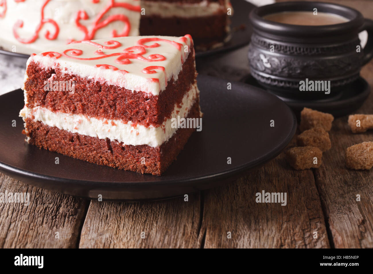 Beautiful delicious slice of red velvet cake on a plate macro ...