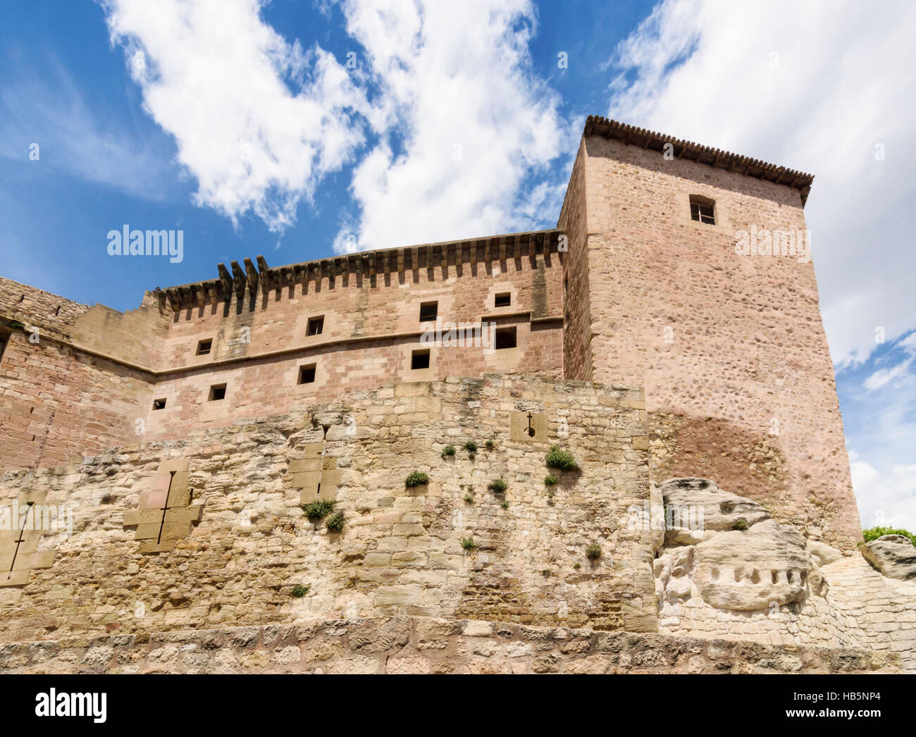 Looking up at the imposing facade of the Castle of Mora de Rubielos ...