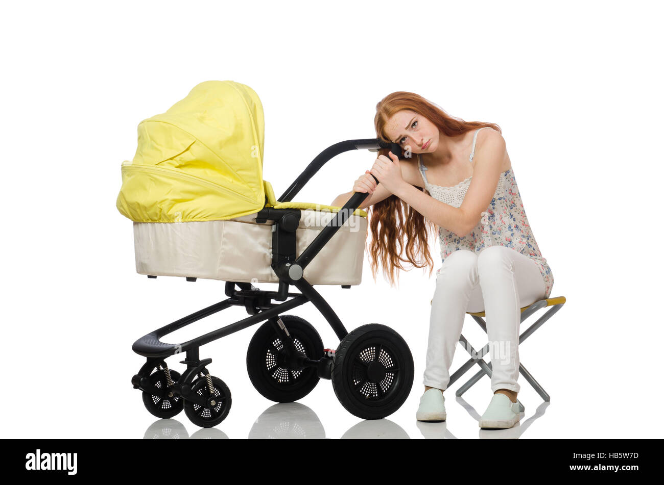 Woman with baby and pram isolated on white Stock Photo - Alamy