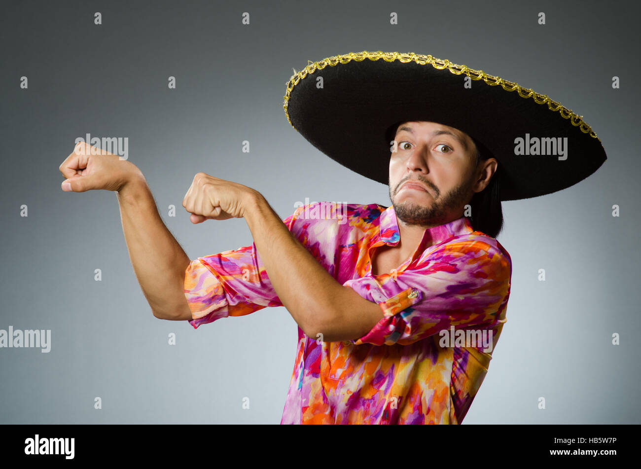 Young mexican man wearing sombrero Stock Photo - Alamy