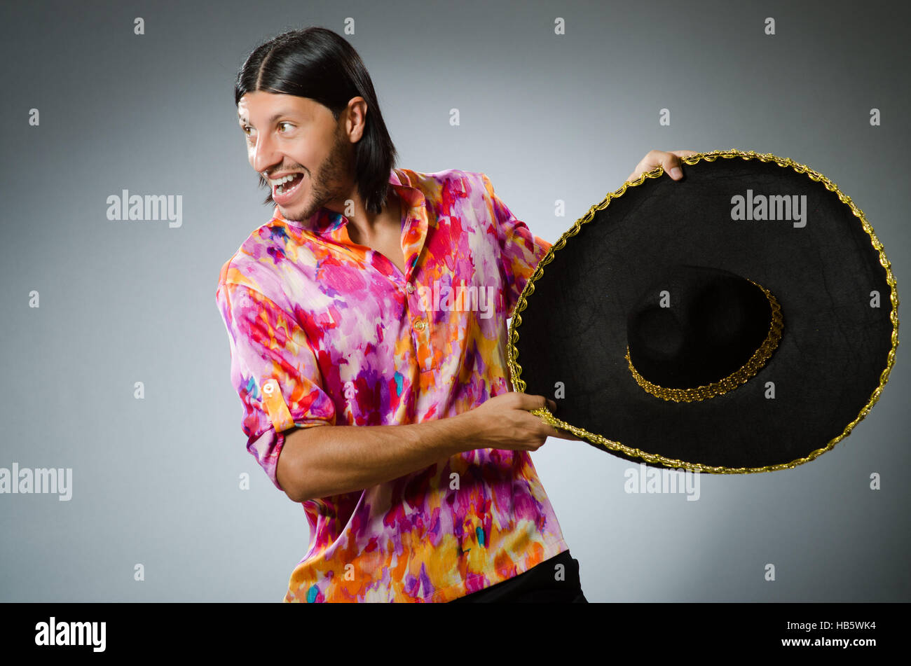 Young mexican man wearing sombrero Stock Photo - Alamy