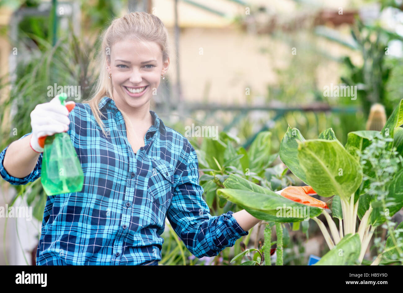 happy female gardener Stock Photo - Alamy