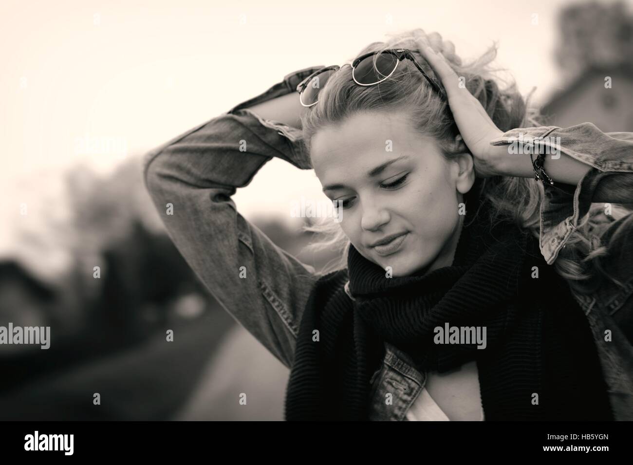 Fixing her hair hi-res stock photography and images - Alamy