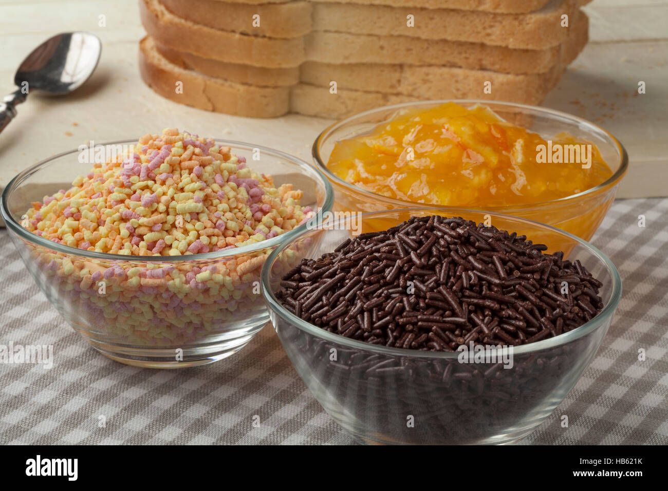Assorted traditional dutch sweets and slices of bread for breakfast ...