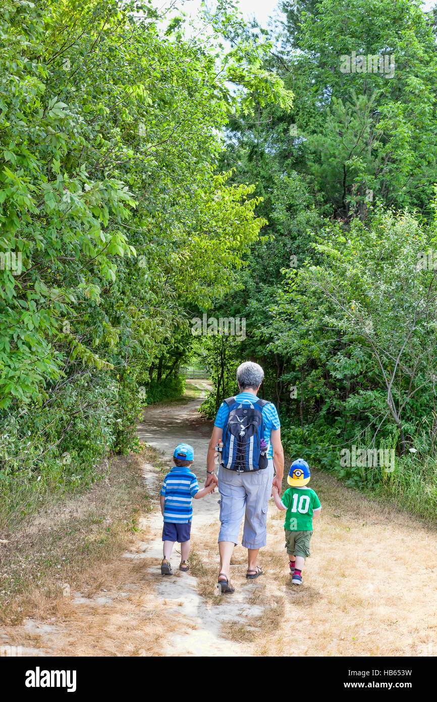 Grandmother and her two Grandkids on a hike at Rouge Valley Park in ...