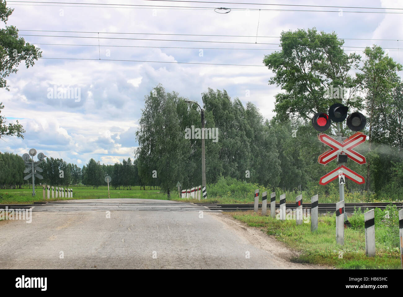 Train Crossing An Railway Crossing At Night Stock Photos & Train ...