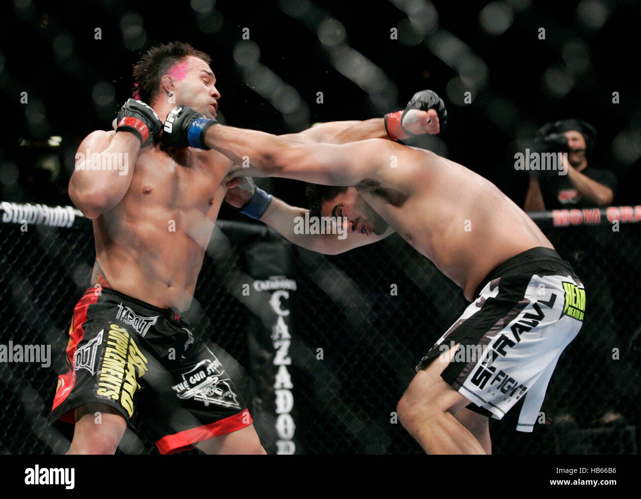 UFC fighter Seth Petruzelli, left, fights Ricardo Romero at UFC 116 at ...