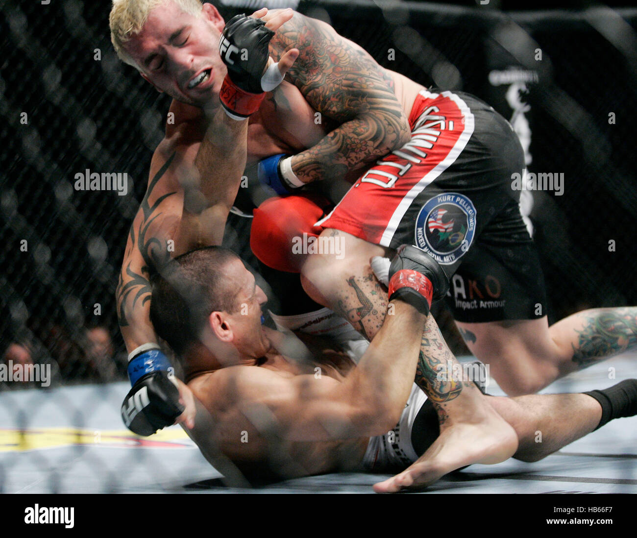 UFC fighter George Sotiropoulos, bottom, fights Kurt Pellegrino at UFC ...