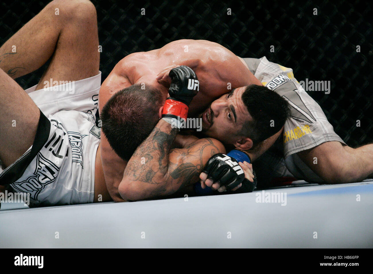 UFC fighter Kendall Grove, bottom, fights Goran Reljic at UFC 116 at ...