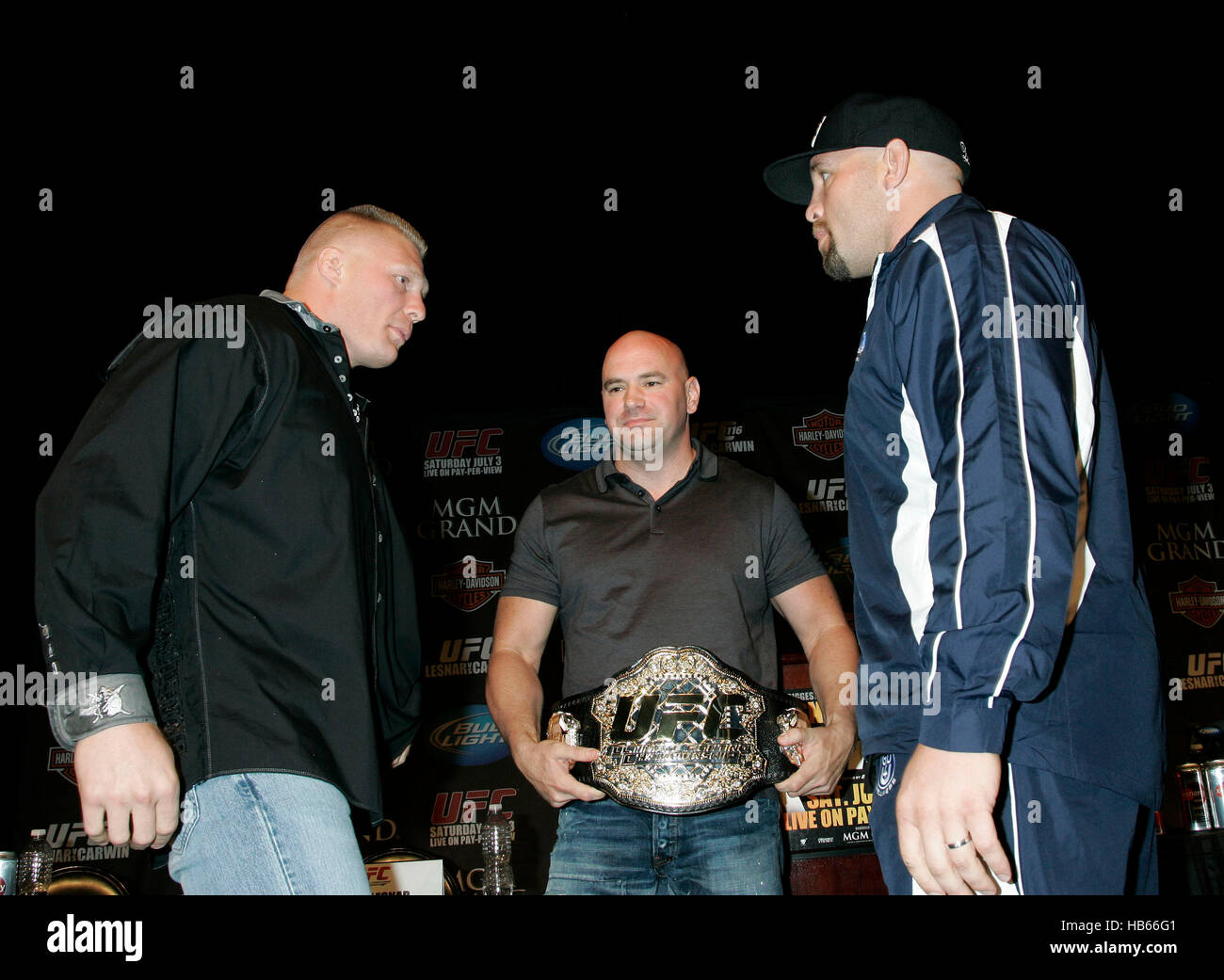 UFC fighter Brock Lesnar, left, UFC President Dana White, center, and ...
