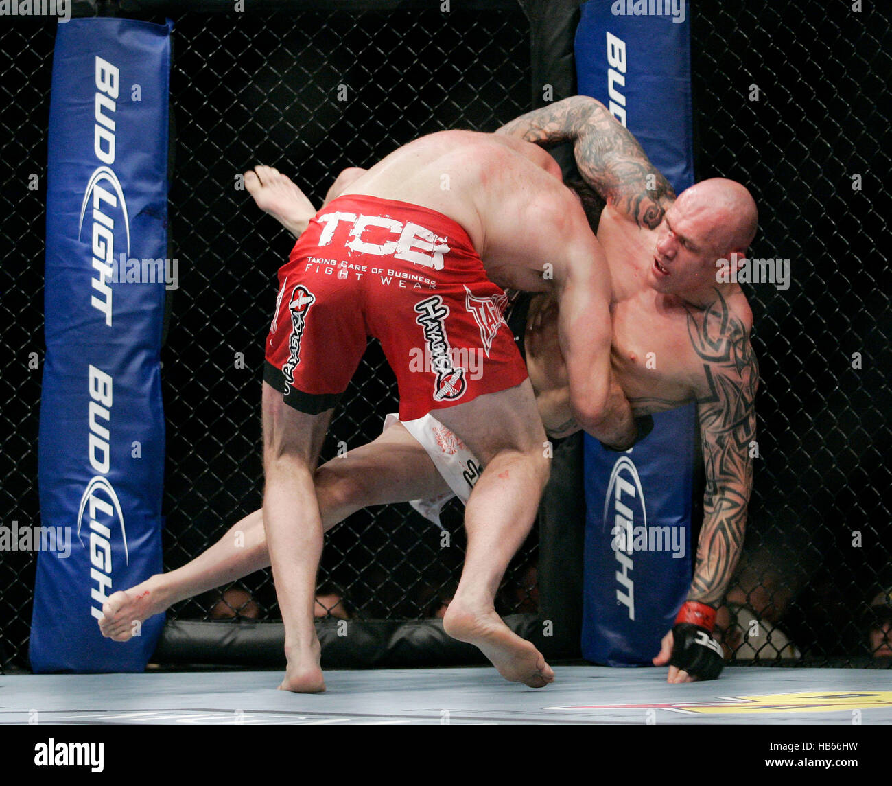 UFC fighter Stephan Bonnar, top, fights Krzysztof Soszynski at UFC 116 ...