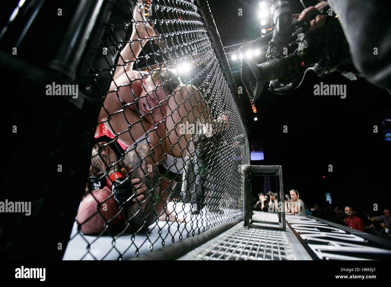 UFC fighter Stephan Bonnar, top, fights Krzysztof Soszynski at UFC 116 ...