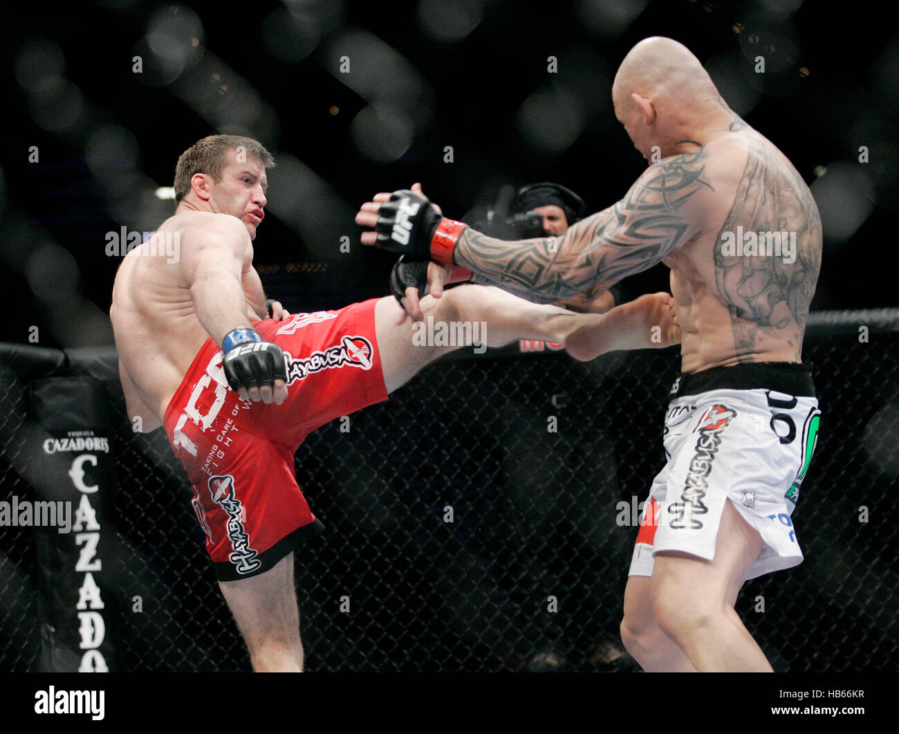 UFC fighter Stephan Bonnar, left, fights Krzysztof Soszynski at UFC 116 ...
