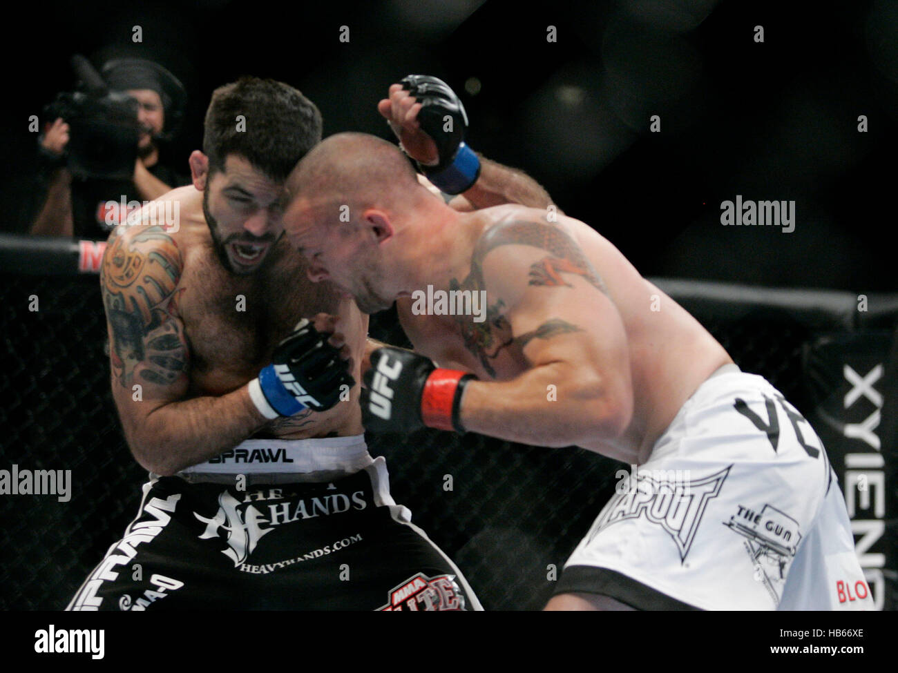 UFC fighter Chris Lytle, right, fights Matt Brown at UFC 116 at the ...
