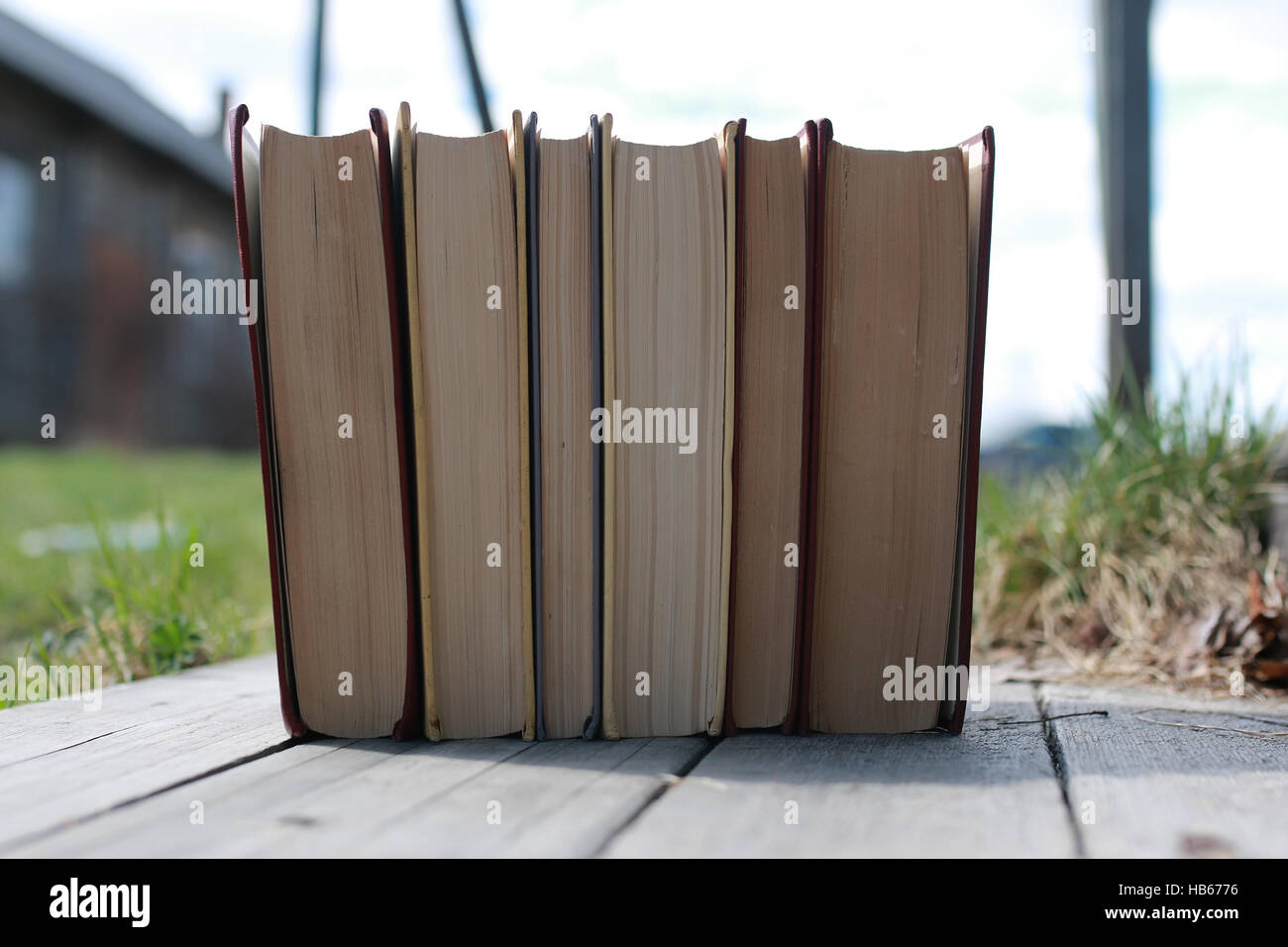 books standing on a table Stock Photo - Alamy