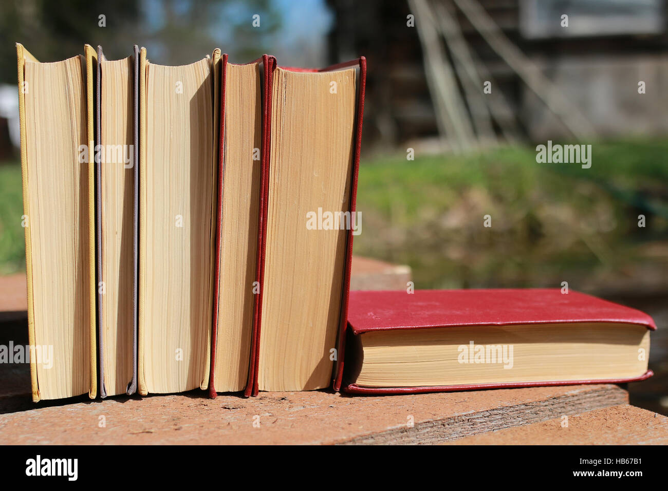 books standing on a table Stock Photo - Alamy