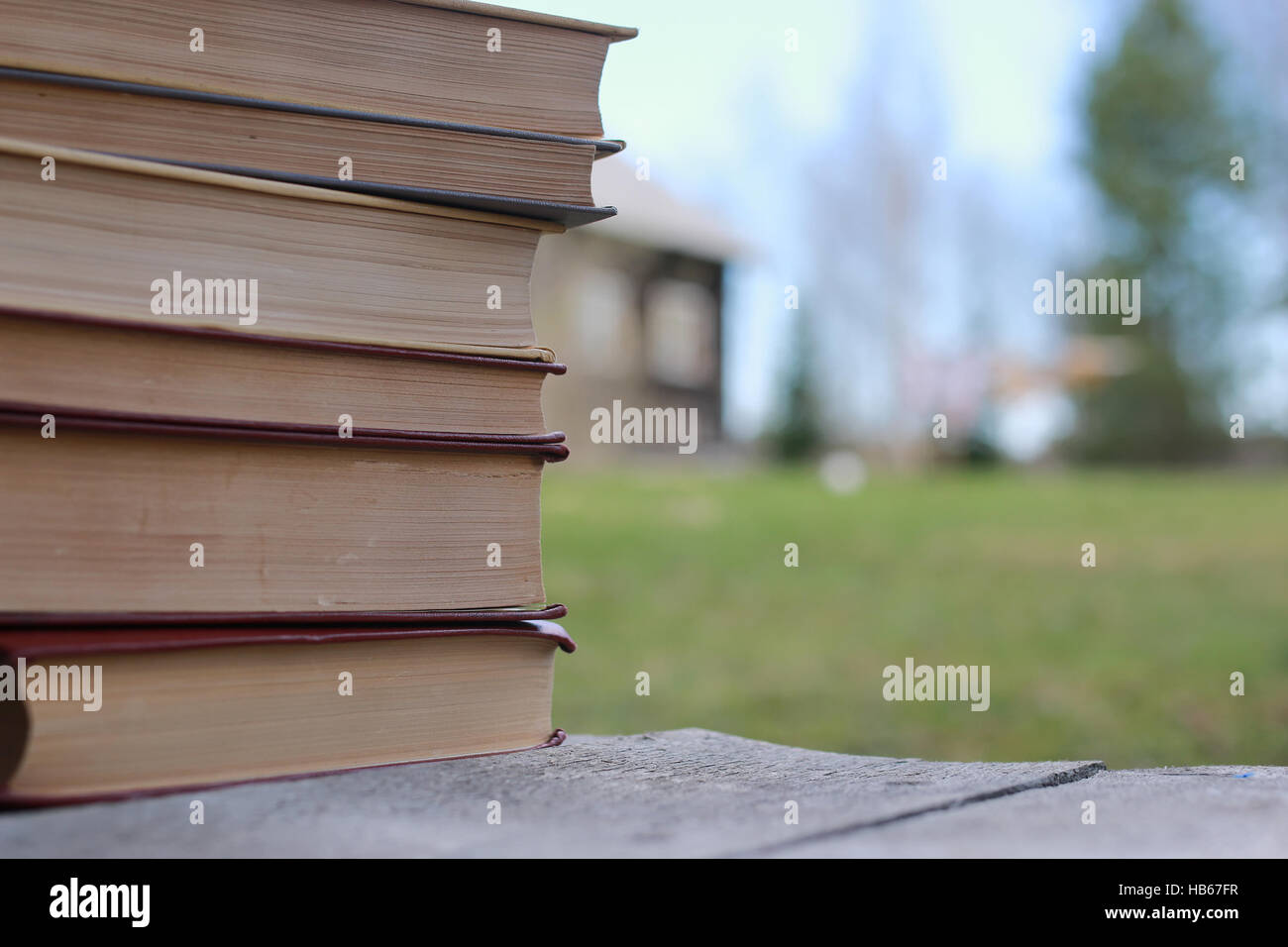 books standing on a table Stock Photo - Alamy