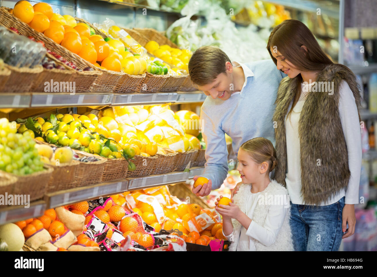 Family in store Stock Photo - Alamy
