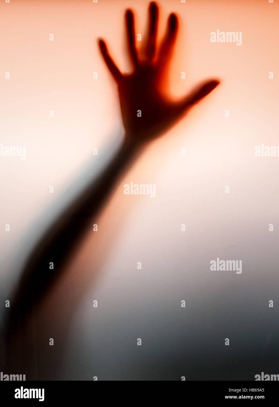 Red hand knocking on the glass Stock Photo - Alamy