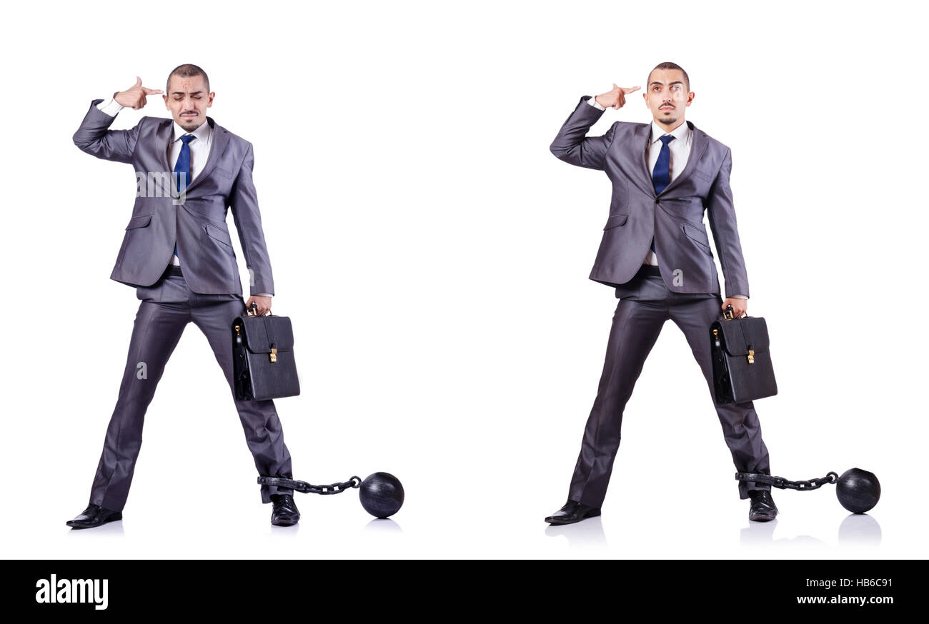 Businessman with shackles on white Stock Photo - Alamy