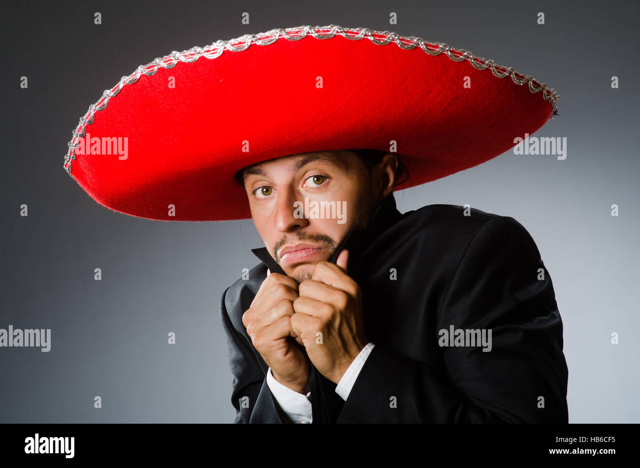Young mexican man wearing sombrero Stock Photo - Alamy