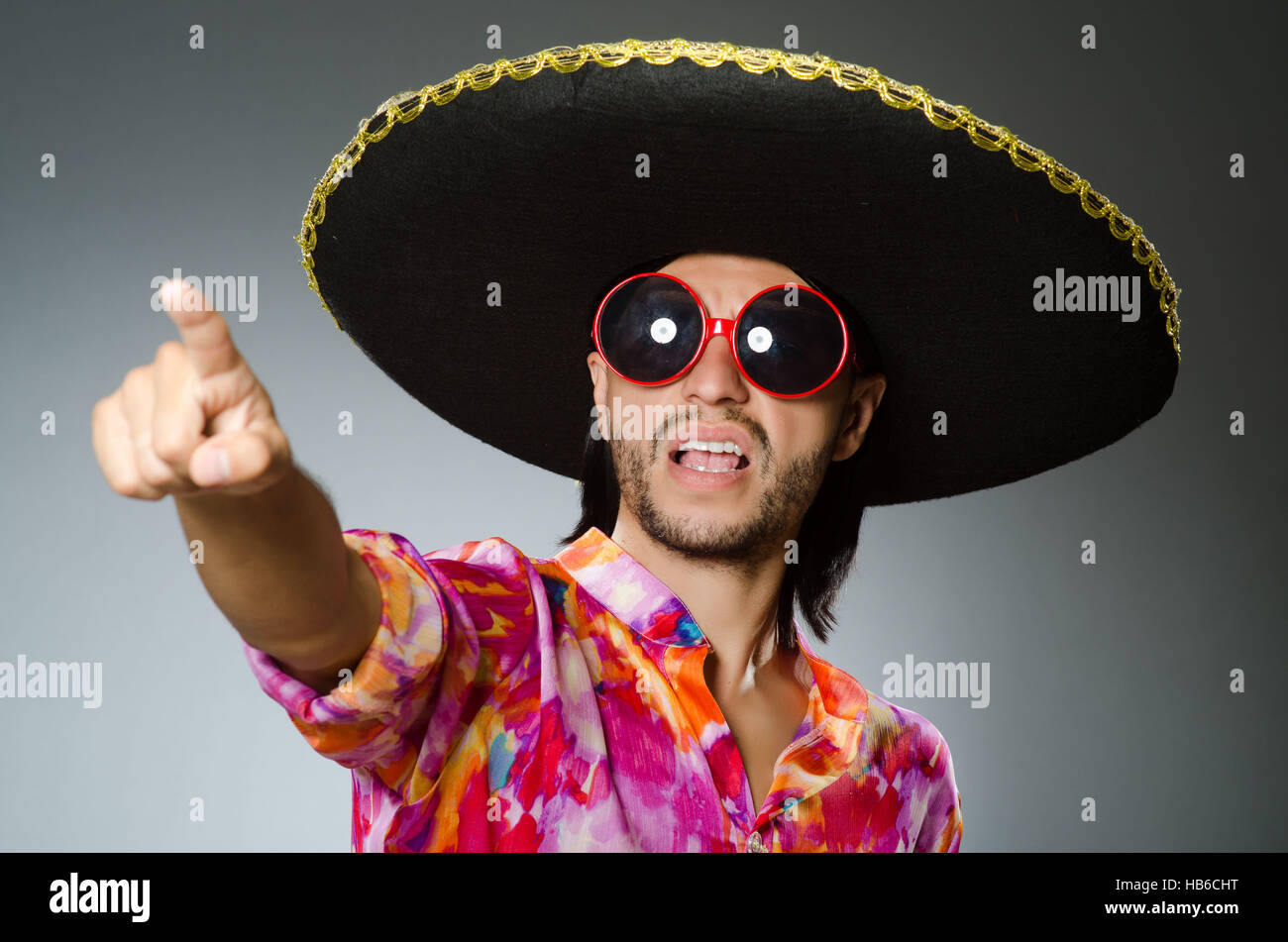 Young mexican man wearing sombrero Stock Photo - Alamy