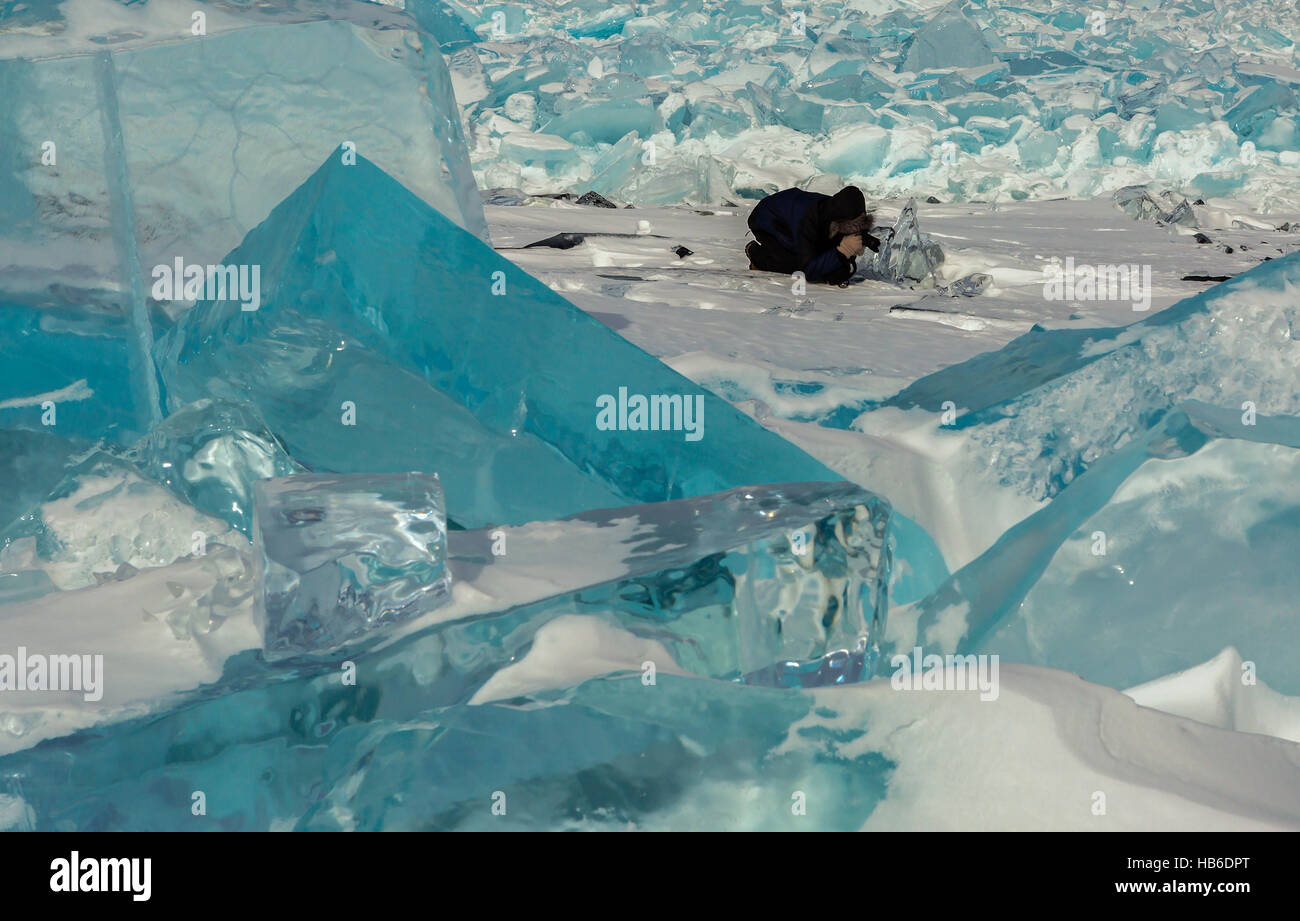 Photographer shoot blocks of ice Stock Photo - Alamy