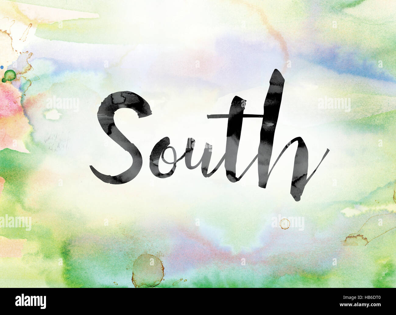 The word "South" painted in black ink over a colorful watercolor washed ...