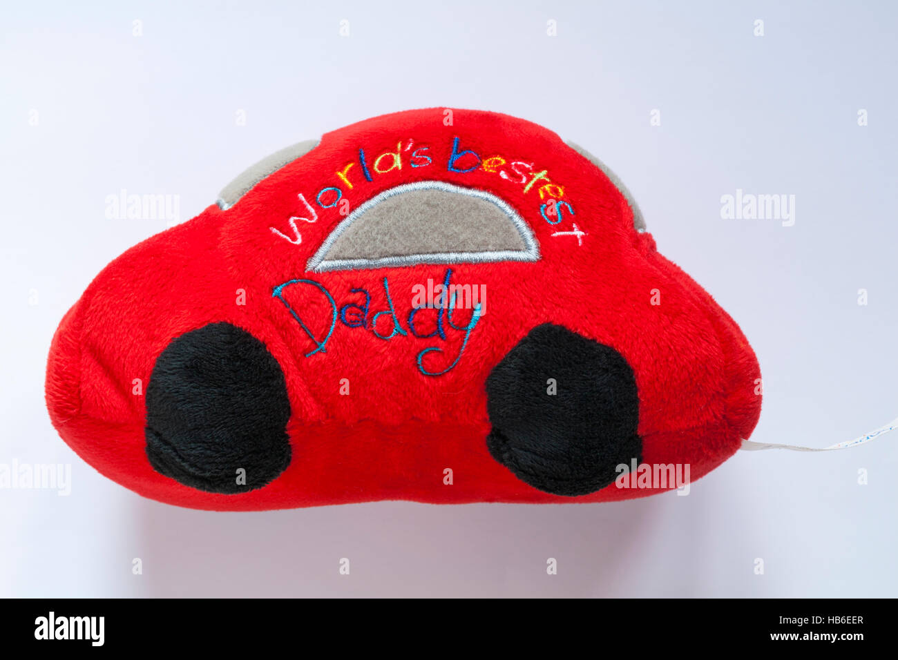 Worlds bestest Daddy red car soft cuddly toy isolated on white ...