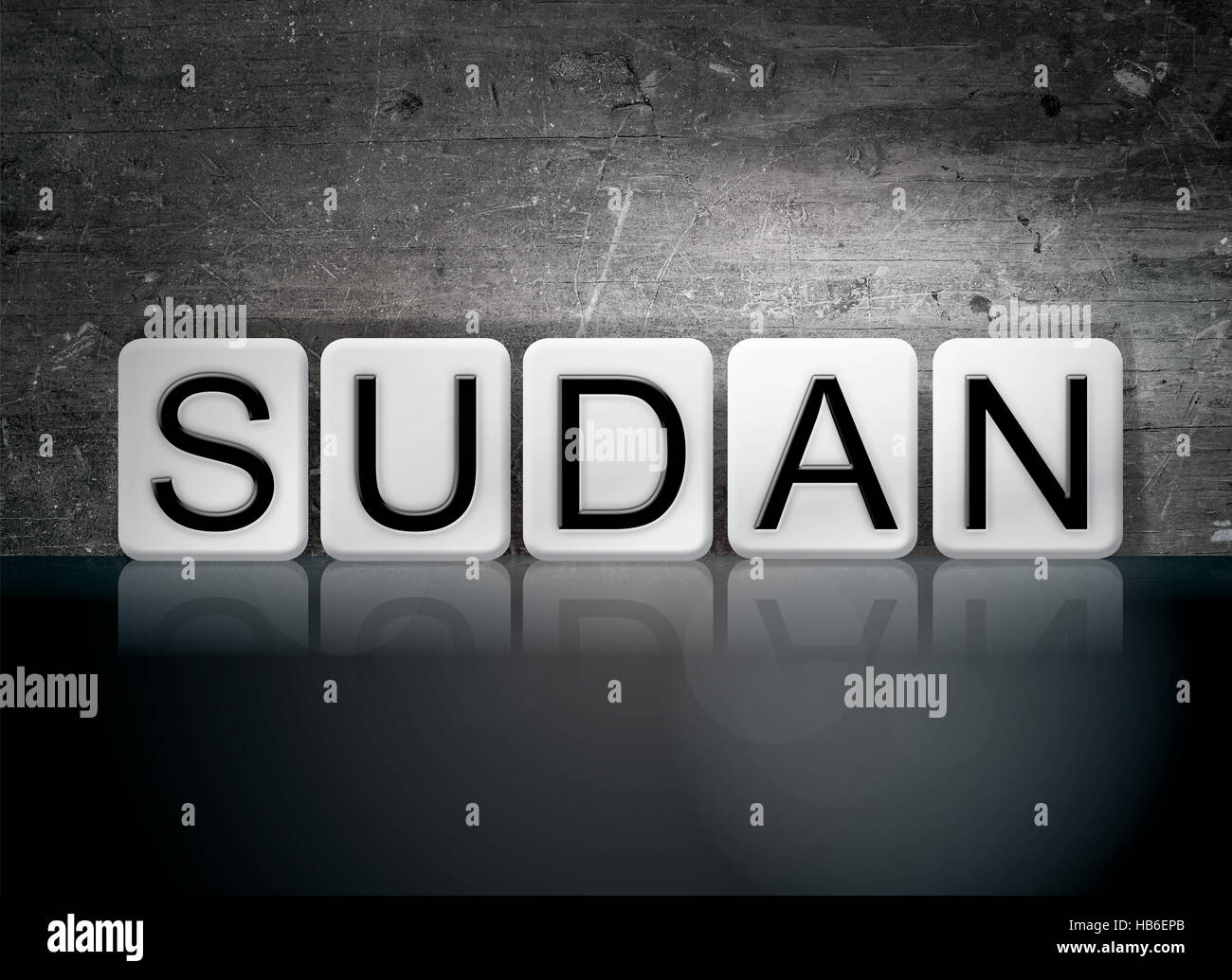 The word "Sudan" written in white tiles against a dark vintage grunge ...
