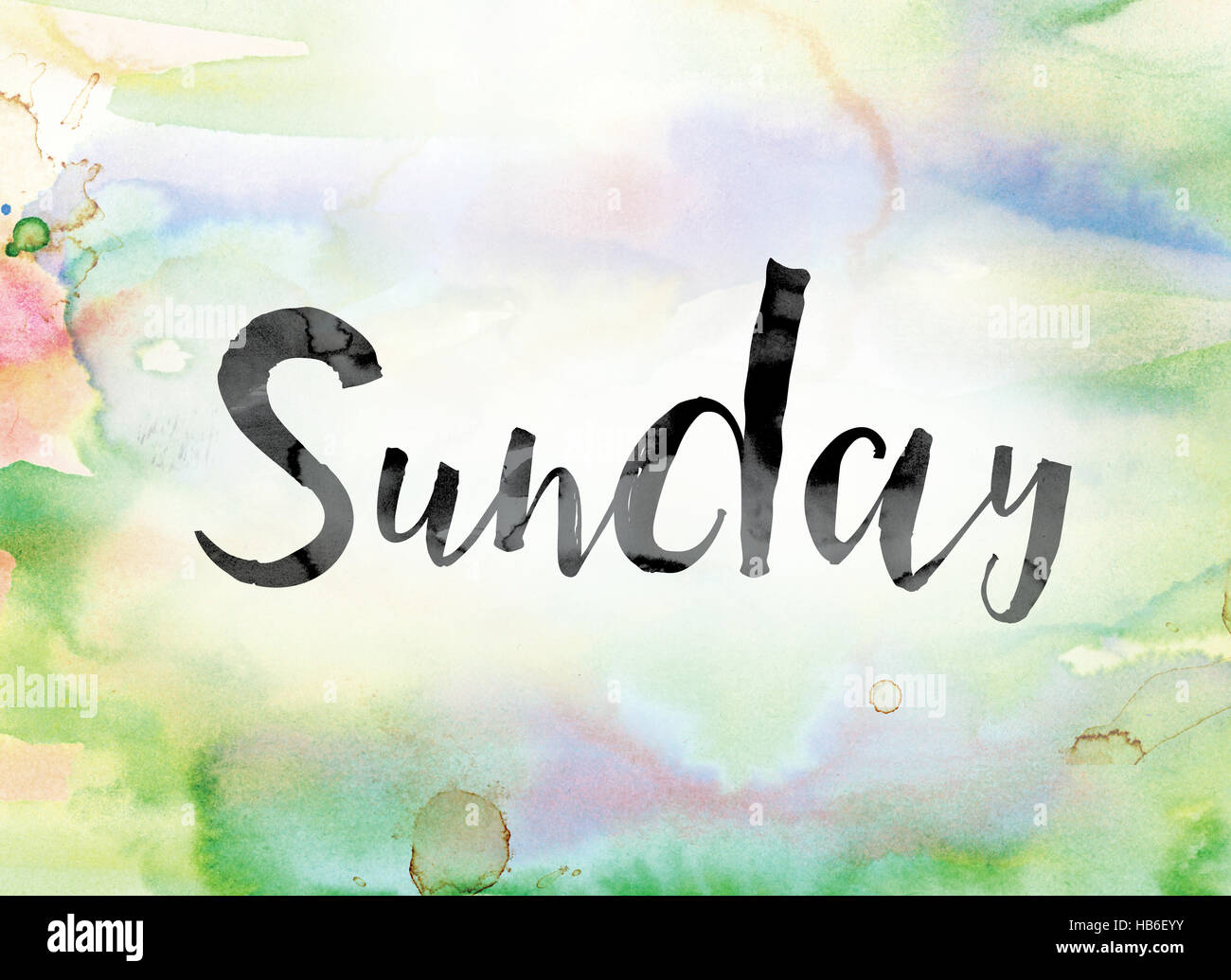 The word "Sunday" painted in black ink over a colorful watercolor ...