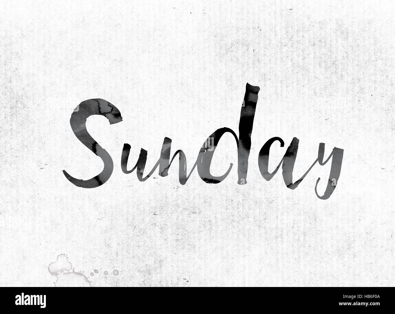 The word "Sunday" concept and theme painted in watercolor ink on a ...