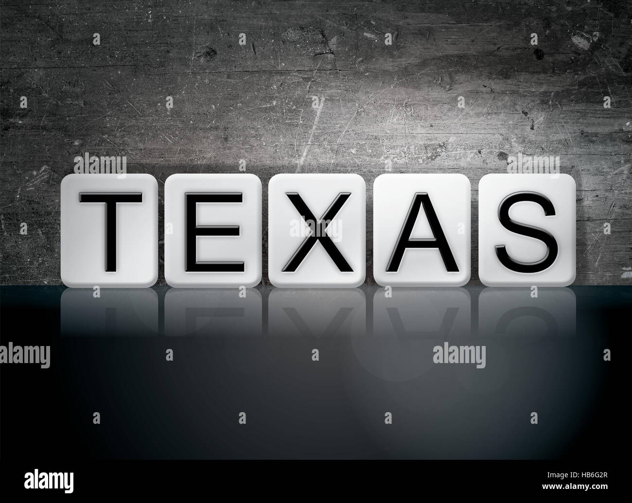 The word "Texas" written in white tiles against a dark vintage grunge ...