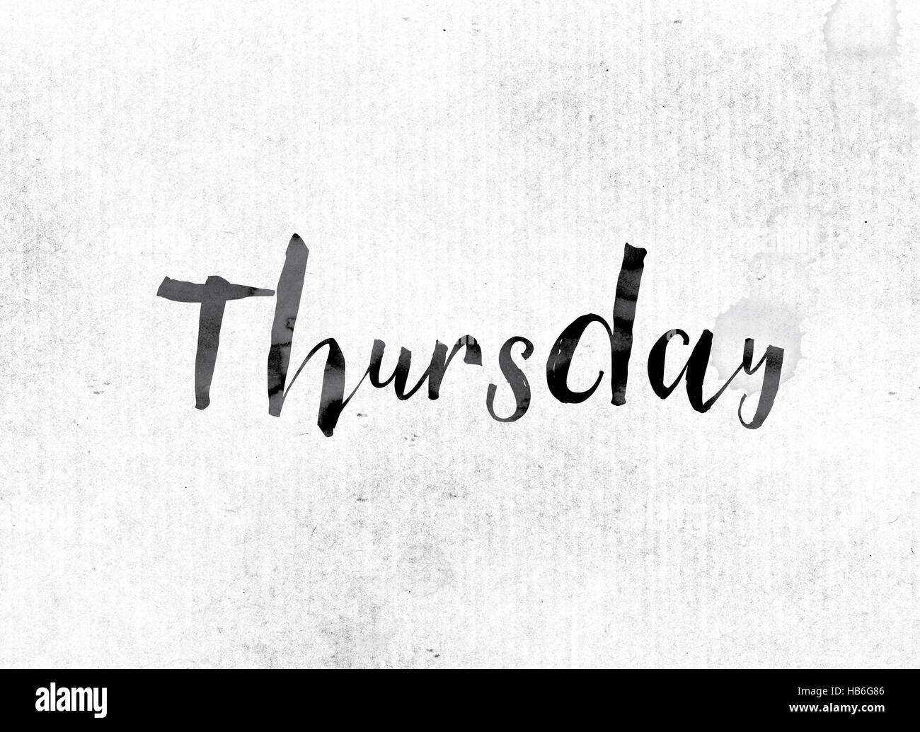The word "Thursday" concept and theme painted in watercolor ink on a ...