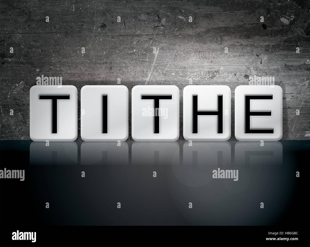 The word "Tithe" written in white tiles against a dark vintage grunge ...