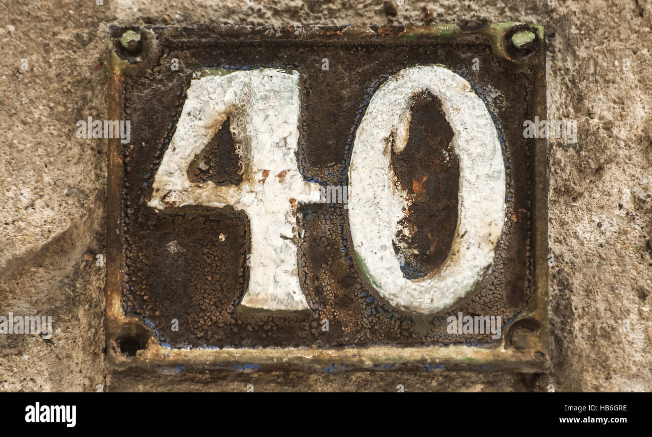 Old retro cast iron plate number 40 Stock Photo - Alamy