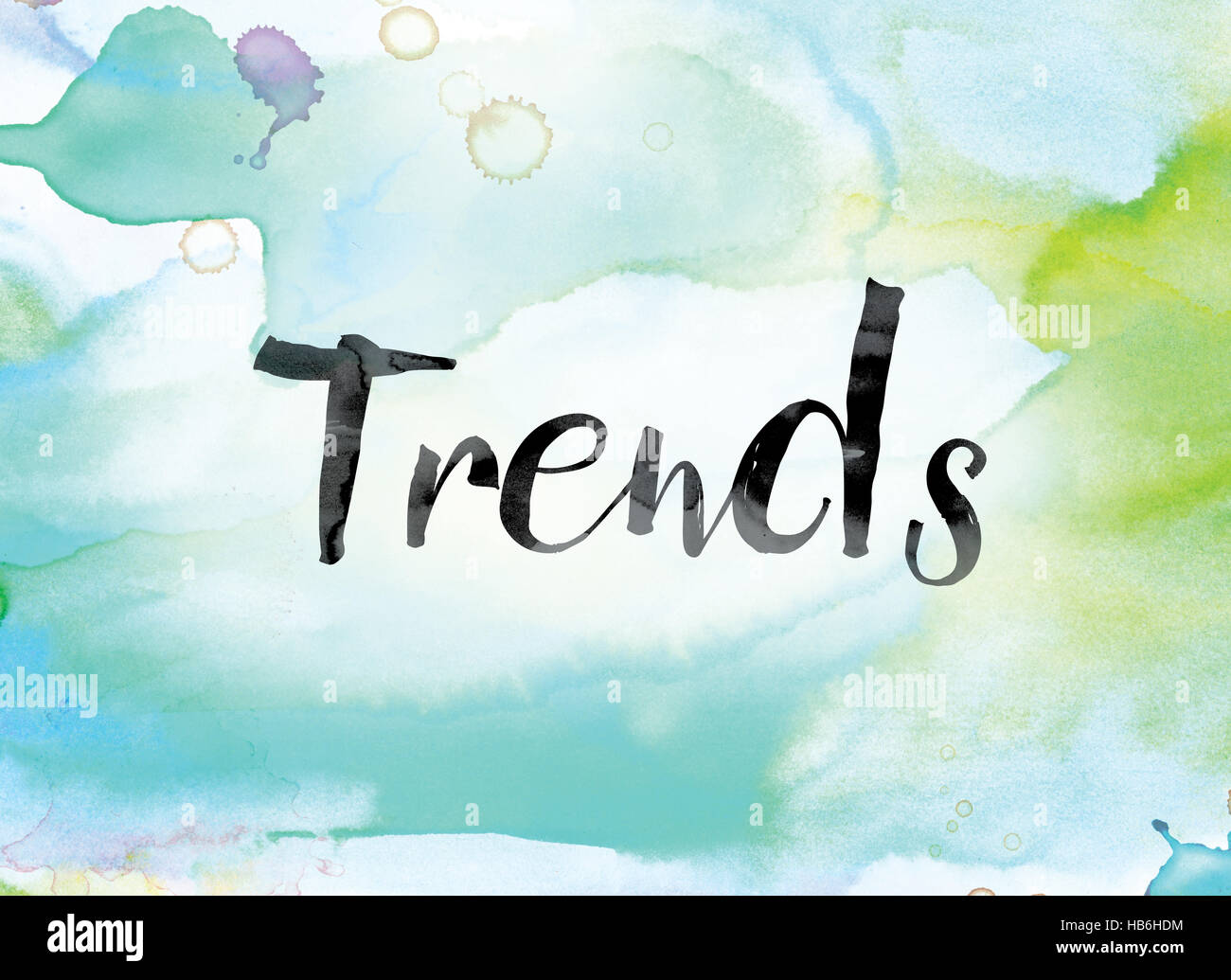 The word "Trends" painted in black ink over a colorful watercolor ...