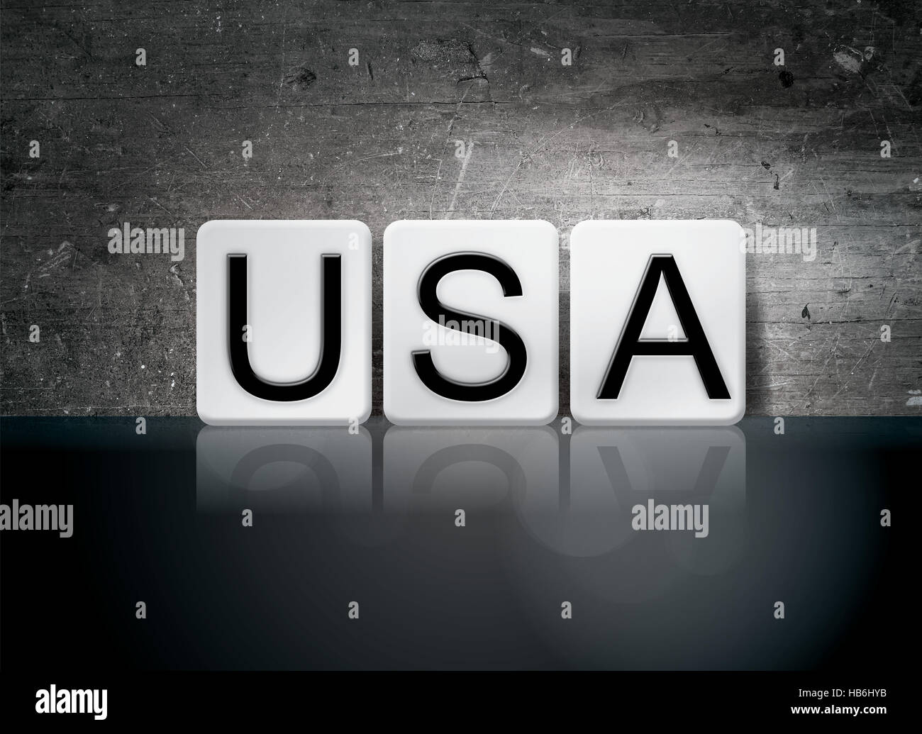 The word "USA" written in white tiles against a dark vintage grunge ...